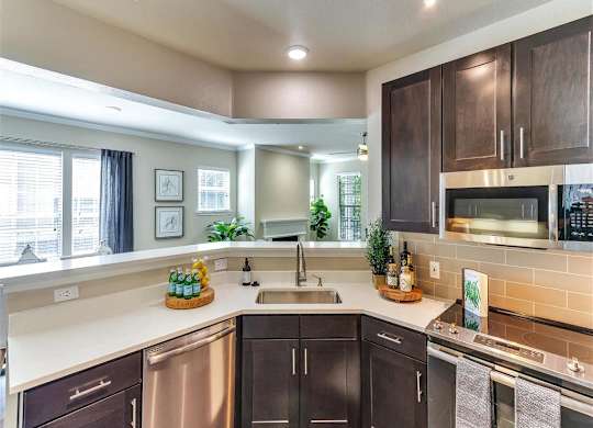 Photos and Video of The Caruth Premier Townhome Apartments in Dallas, TX